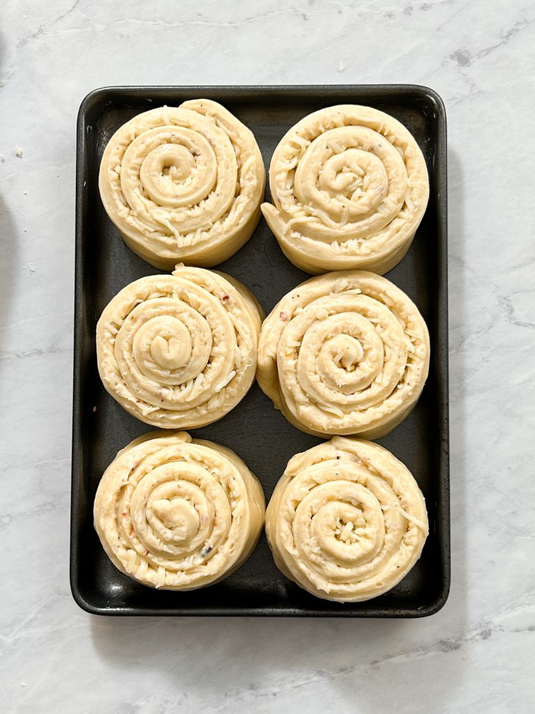 Small Batch Cheesy Bread Rolls With Honey Butter (Cinnamon Roll Style)